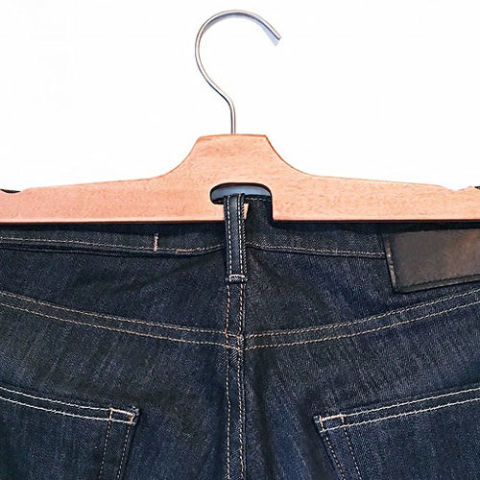 Stop Throwing Your Jeans on the Floor and Buy This Hanger Instead